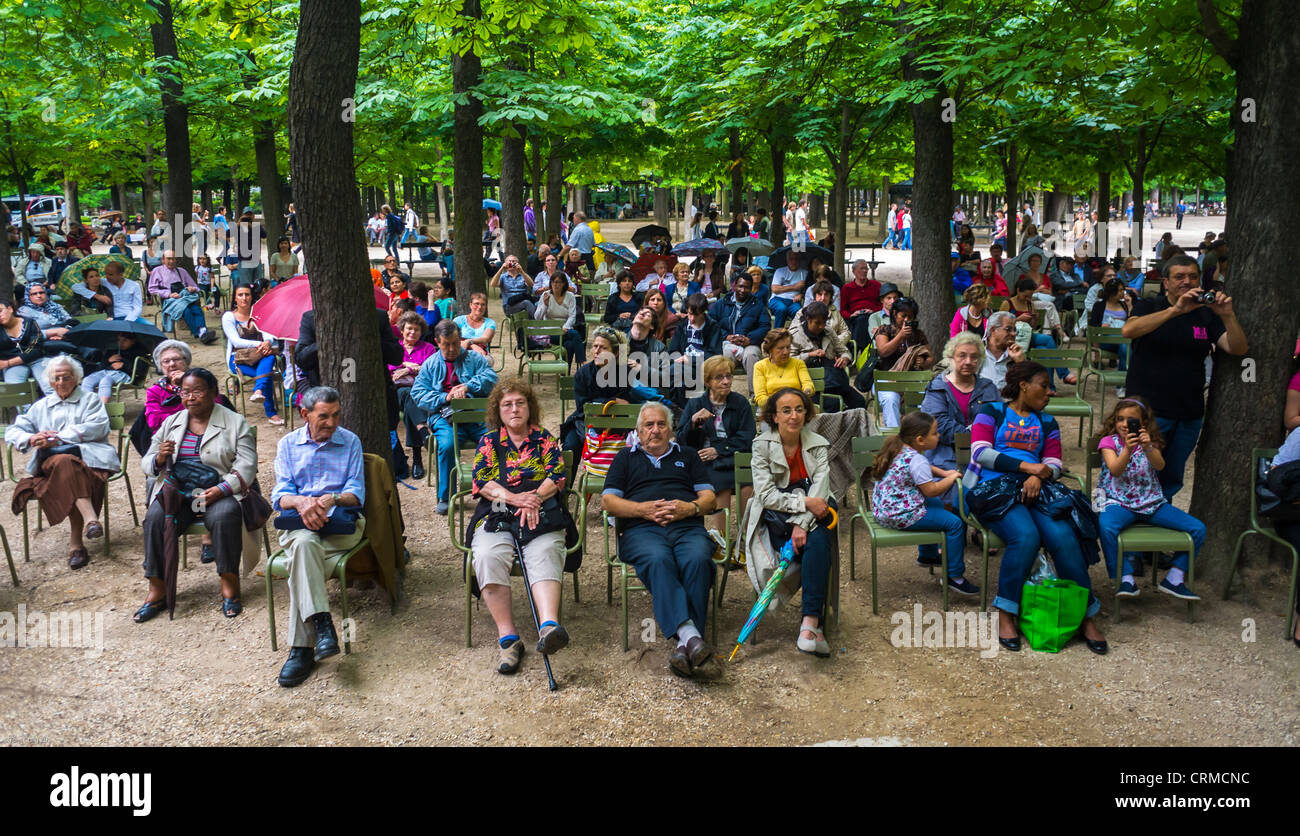 paris, France, French Audience, Crowd in Rain With Umbrellas Listening ...