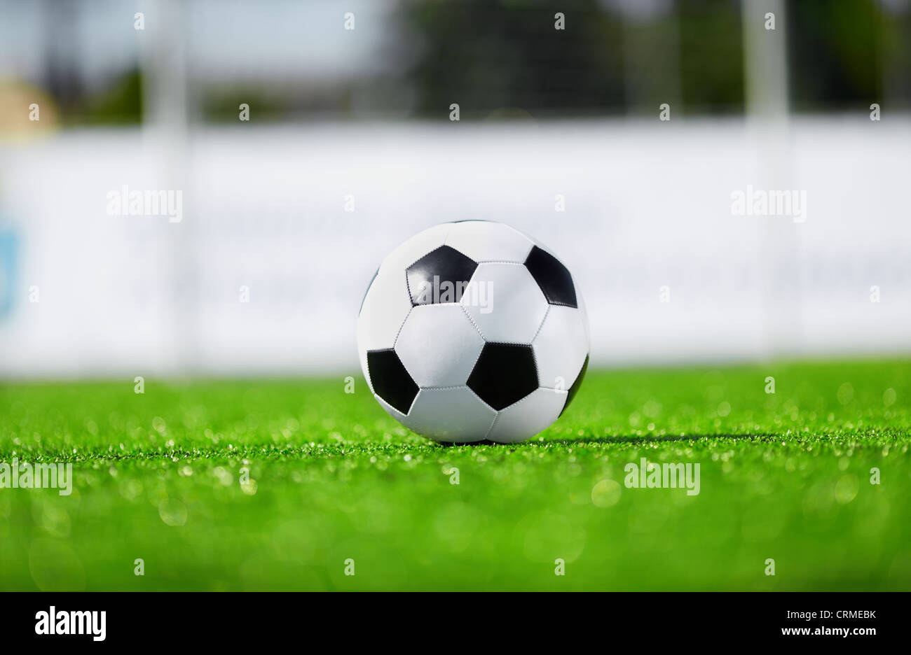 new and clean soccer ball on field Stock Photo - Alamy