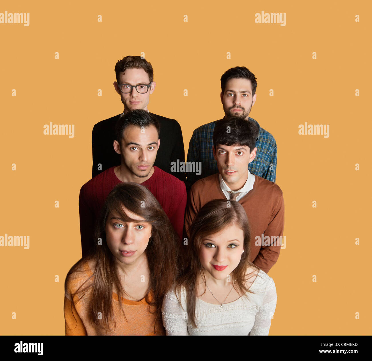 Portrait of multiethnic group of friends over colored background Stock ...