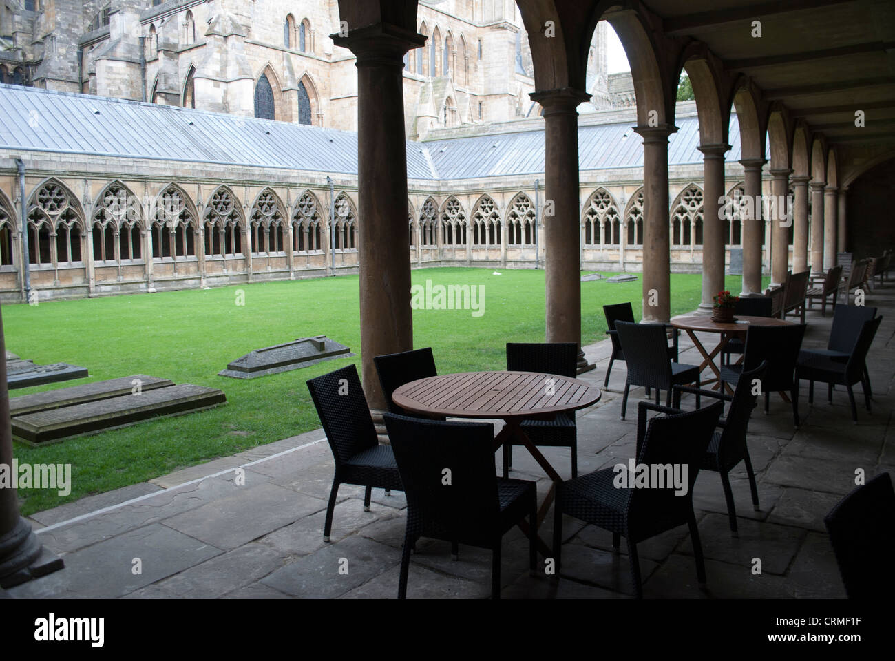Tables and chairs in cloister of Lincoln Catherdral Stock Photo - Alamy