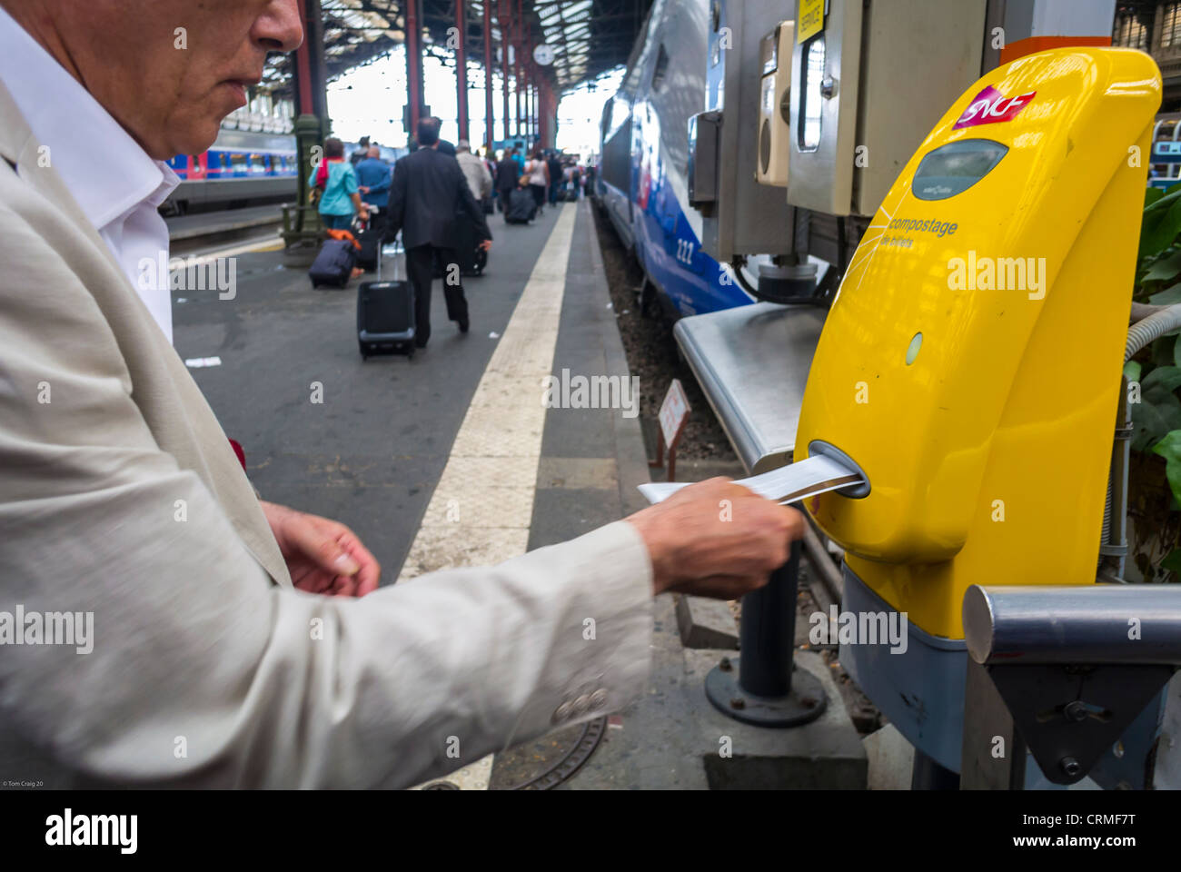 Paris, France, Man Certifying Train Ticket in Machine on Quay in Train ...