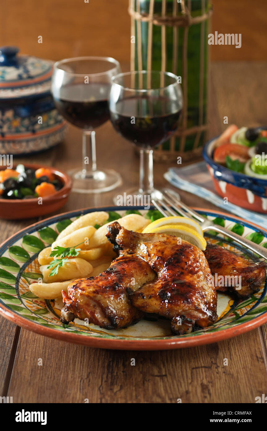 Frango assado Portuguese grilled chicken Stock Photo - Alamy