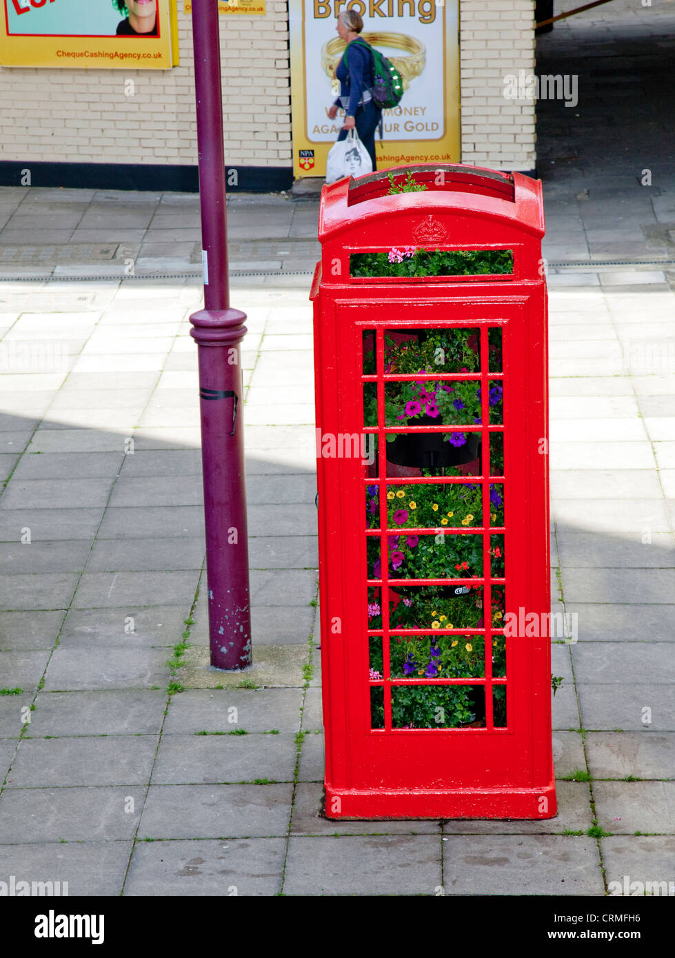 Red telephone boxes converted to flower boxes in Archway, London Stock ...