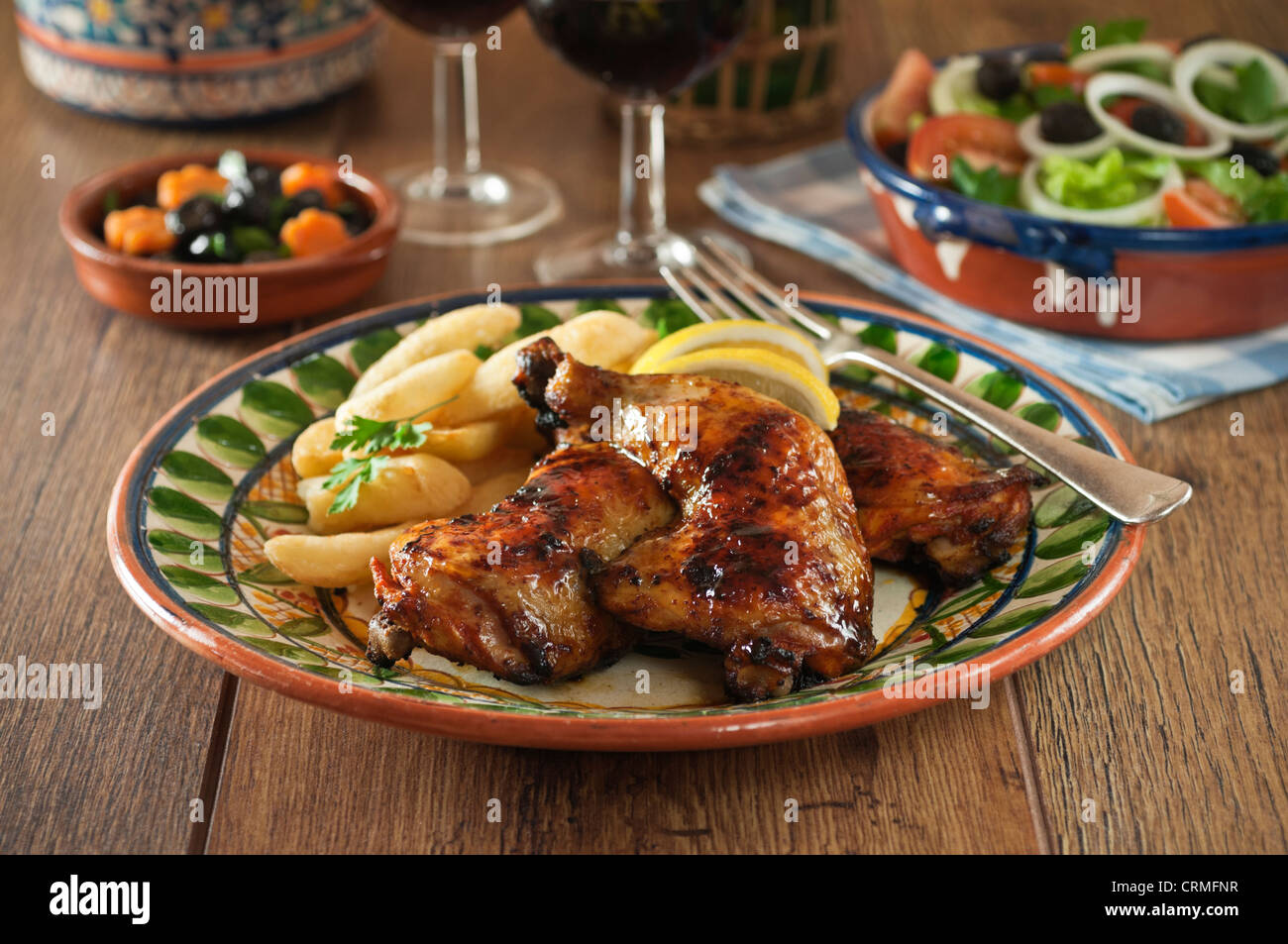 Frango assado Portuguese grilled chicken Stock Photo - Alamy