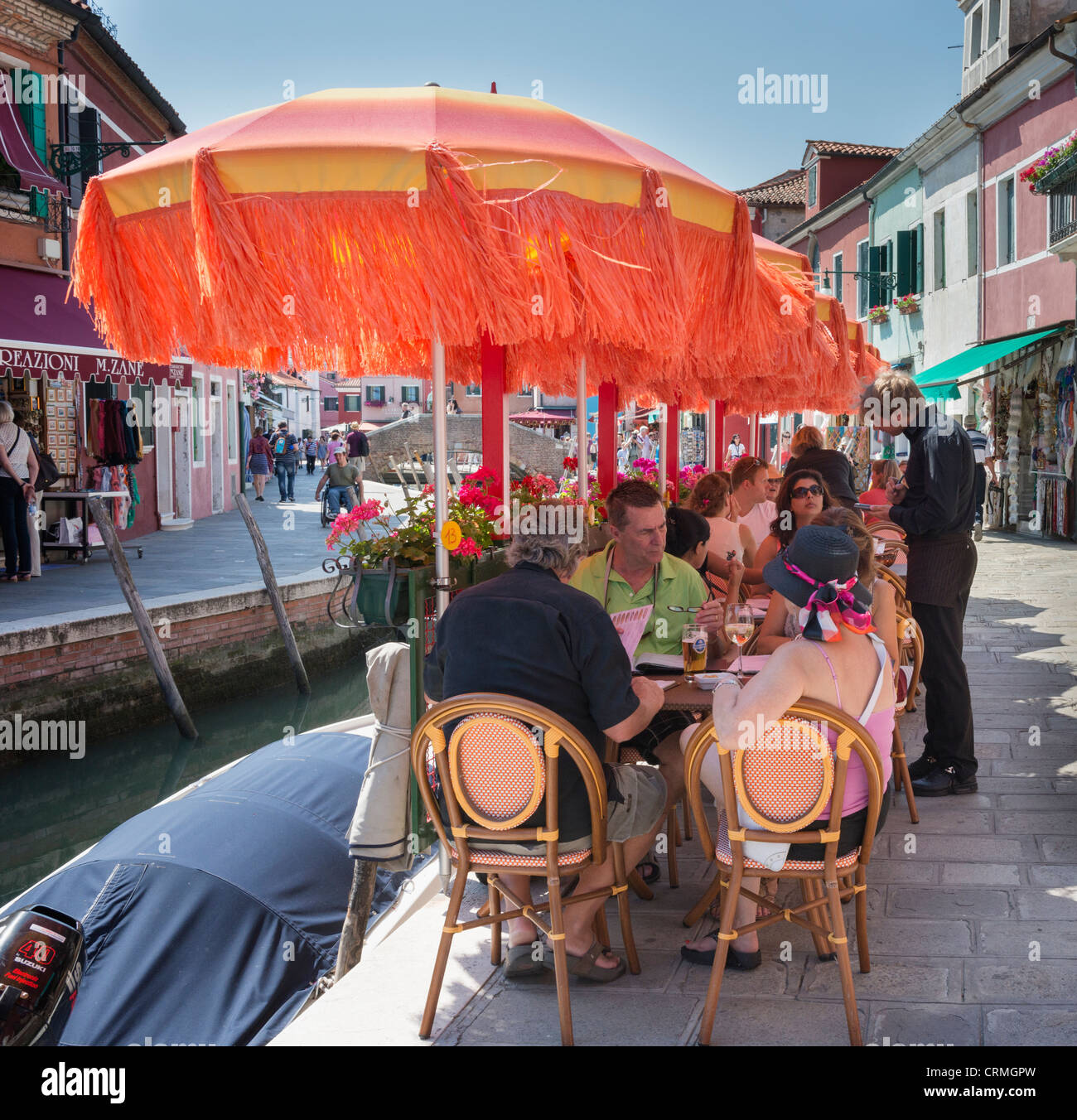 A canal side restaurant in Burano Stock Photo - Alamy