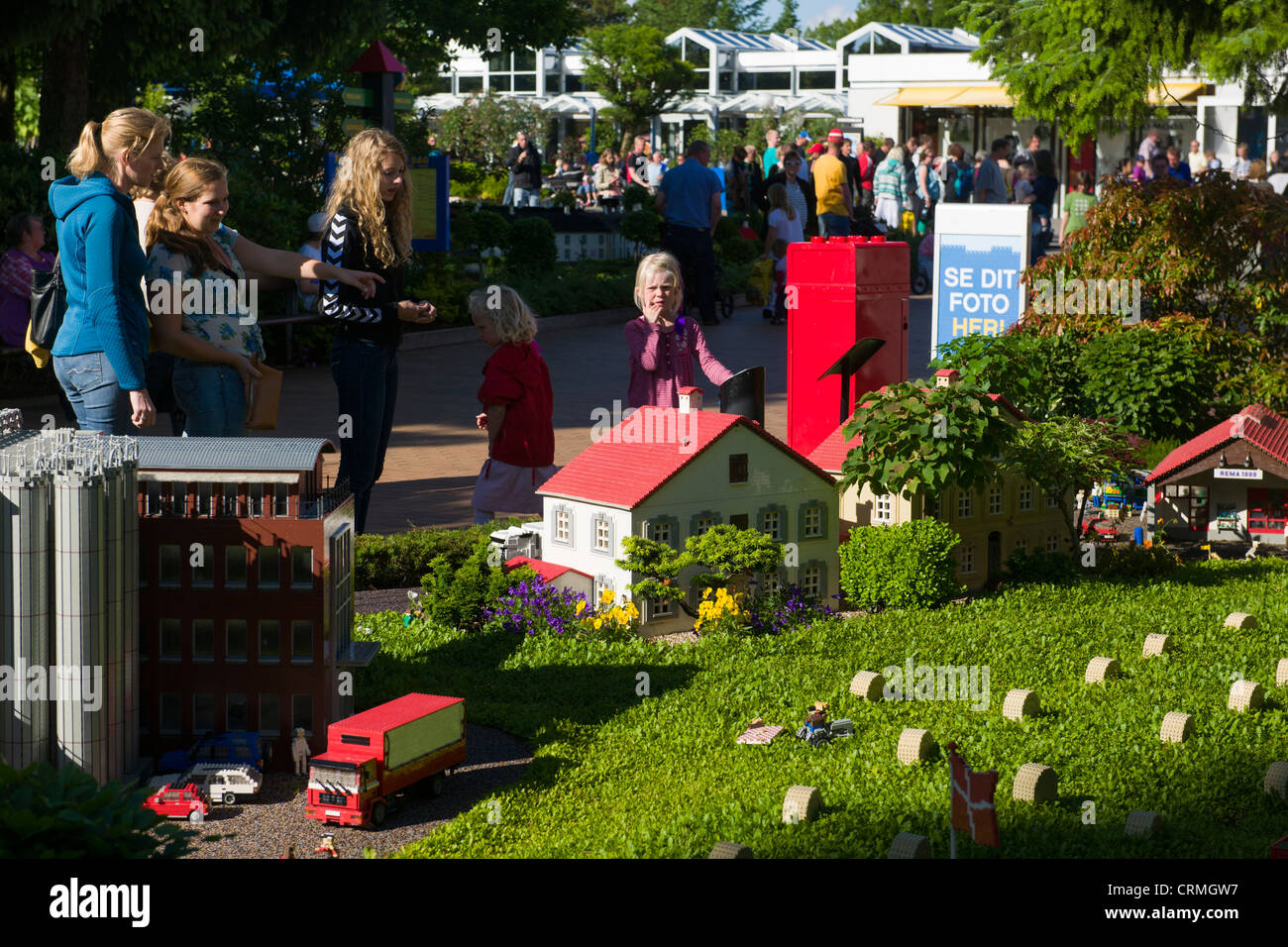 Family looking at a Lego farm, Miniland, Legoland, Billund, Denmark ...