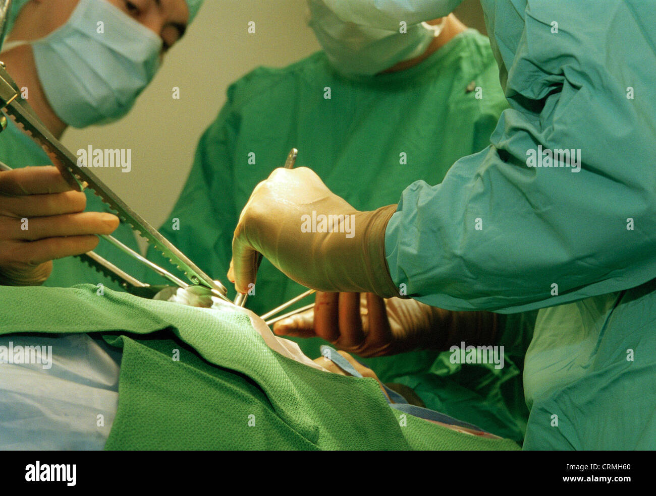 The hands of surgeons during a surgery Stock Photo - Alamy