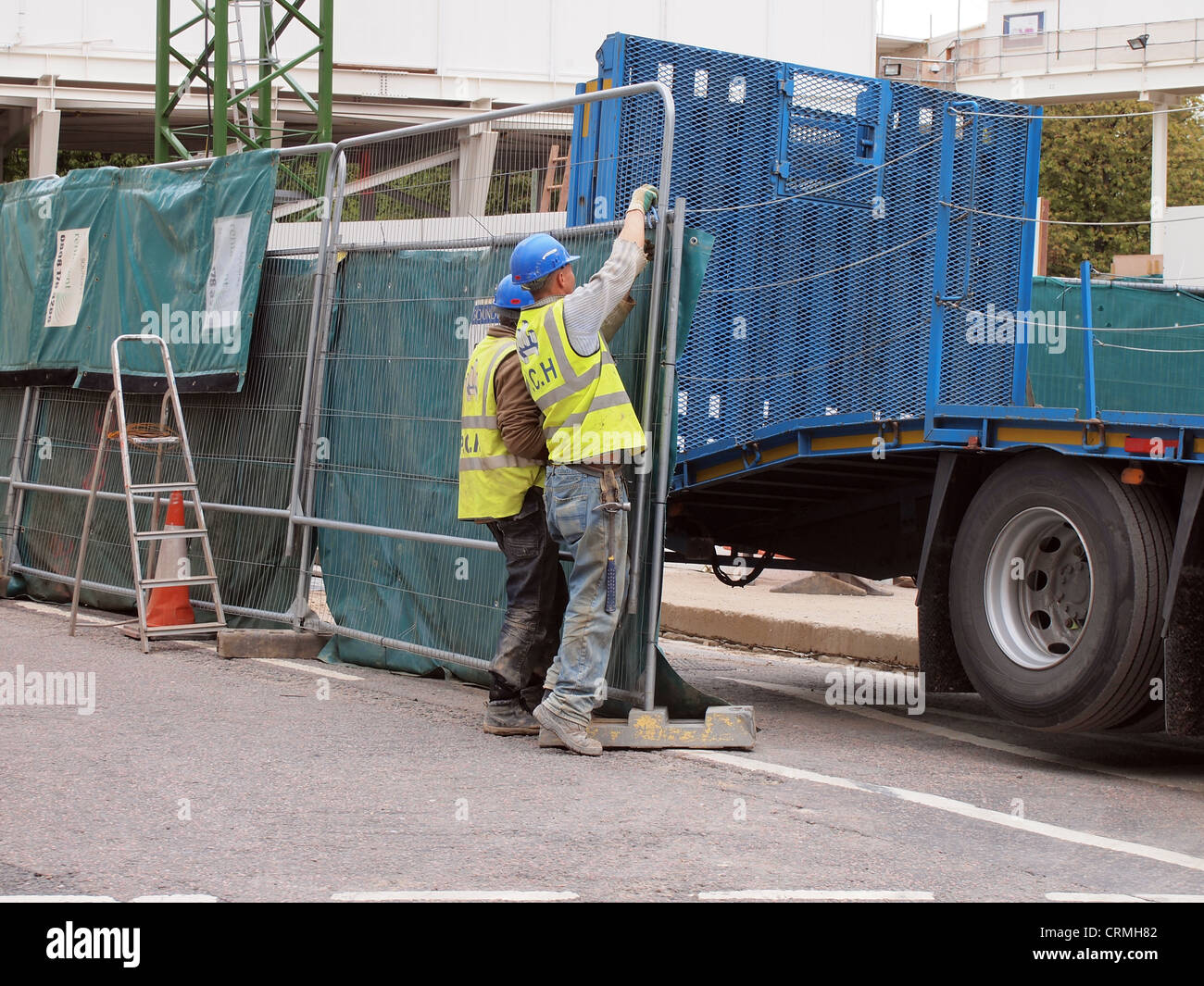 Construction workers at a building site in London, England, May 17 ...
