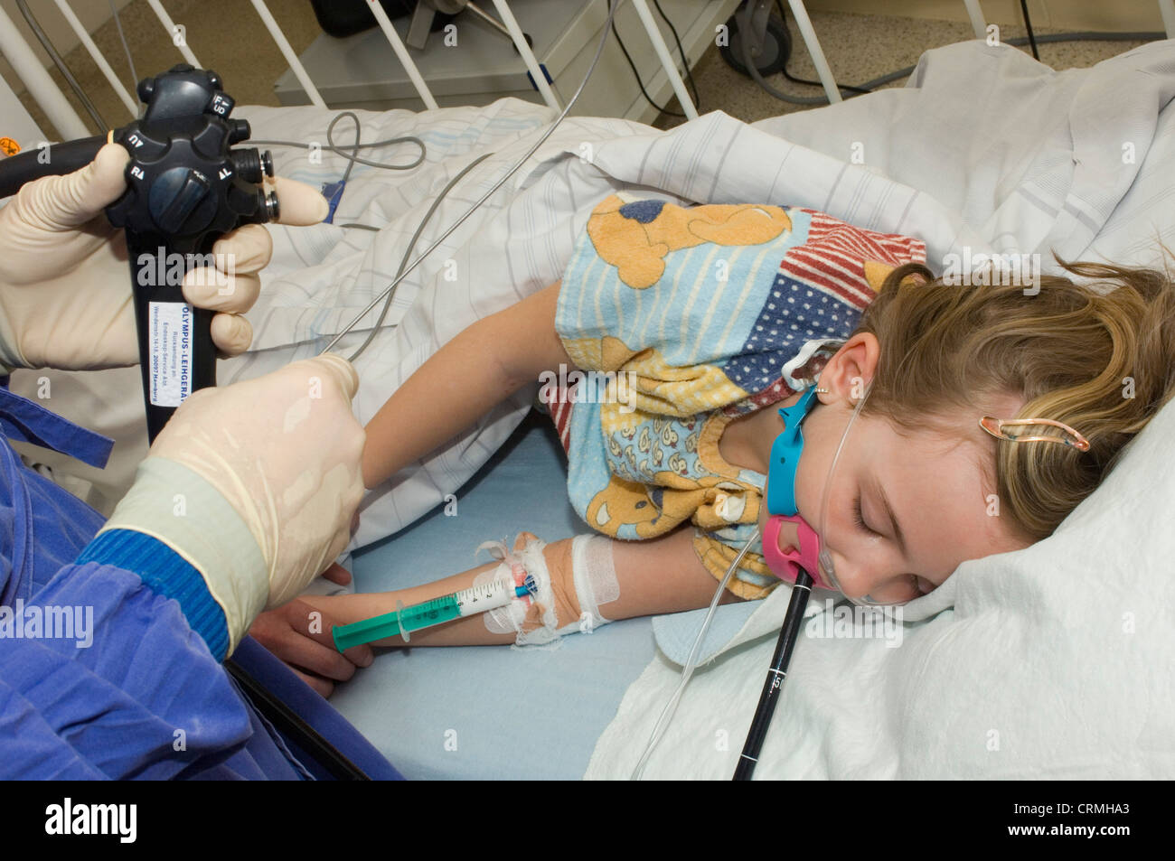 A surgeon using an endoscope probe to perform a visual internal ...
