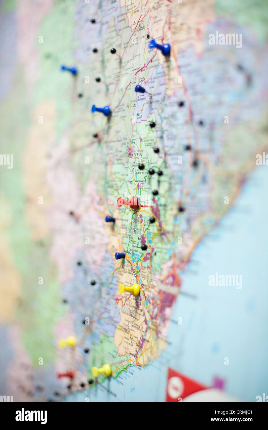 Thumbtacks on a map Stock Photo - Alamy