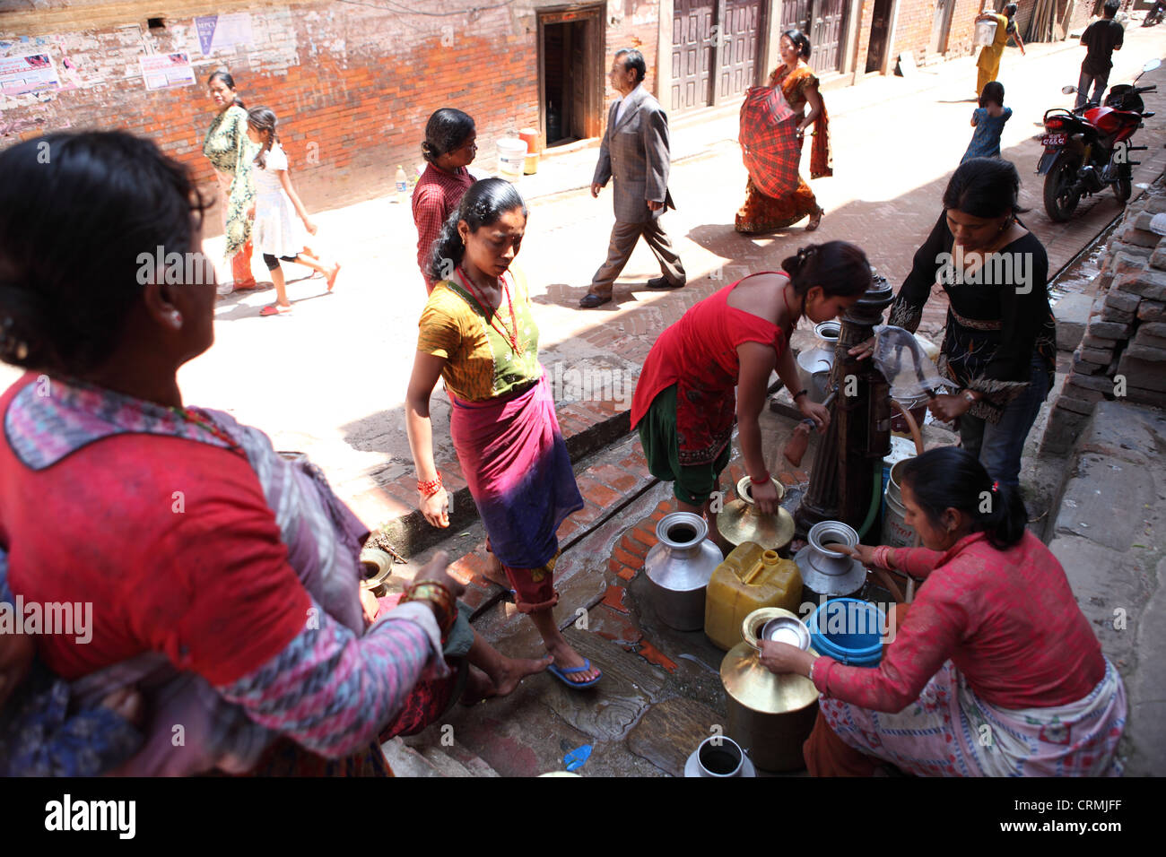 Women fetch water in Nepal Stock Photo - Alamy
