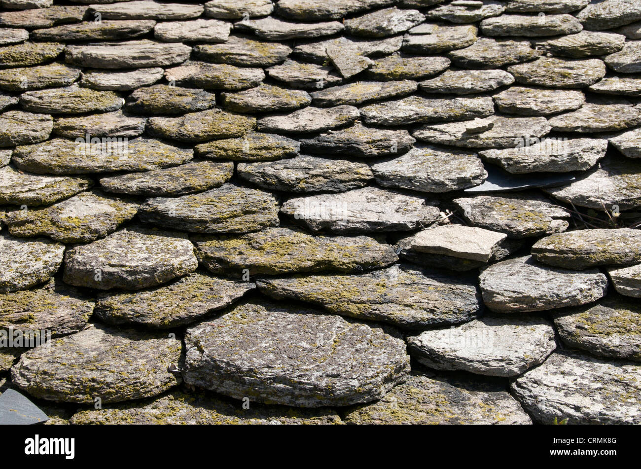 Traditional slate roof craftsmanship in Auvergne, France Stock Photo ...