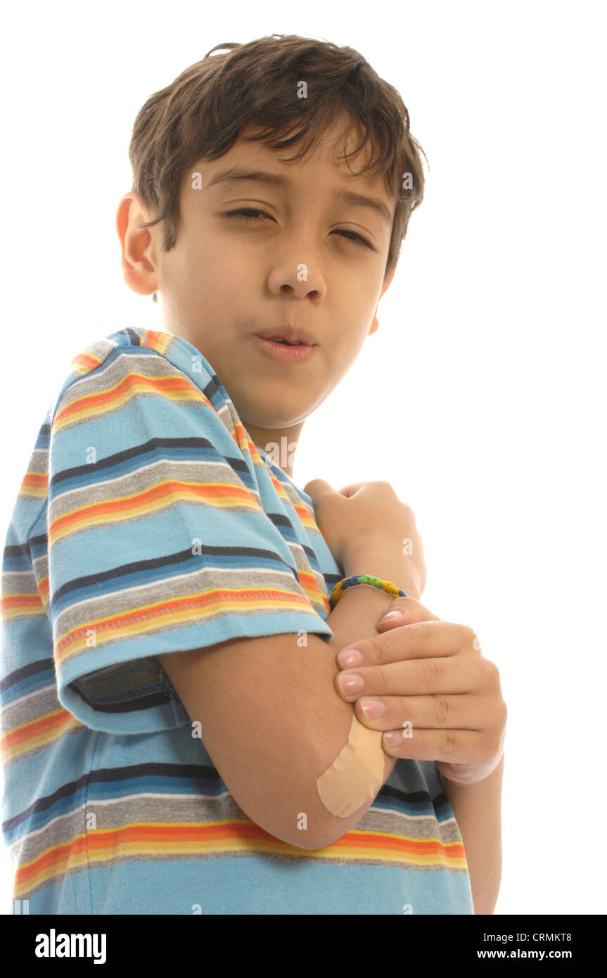 A young boy displaying a plaster on his elbow Stock Photo - Alamy