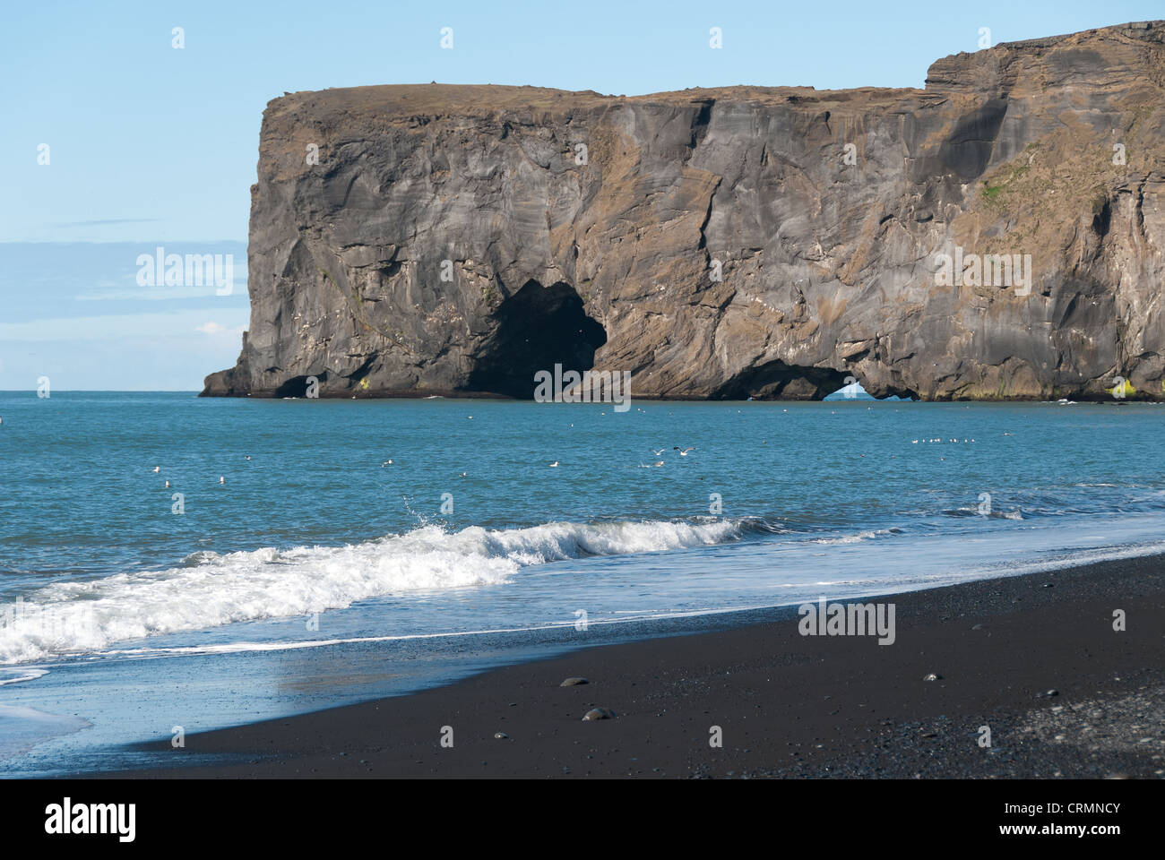 Jagged cliff on the beach in Vik Iceland Stock Photo - Alamy