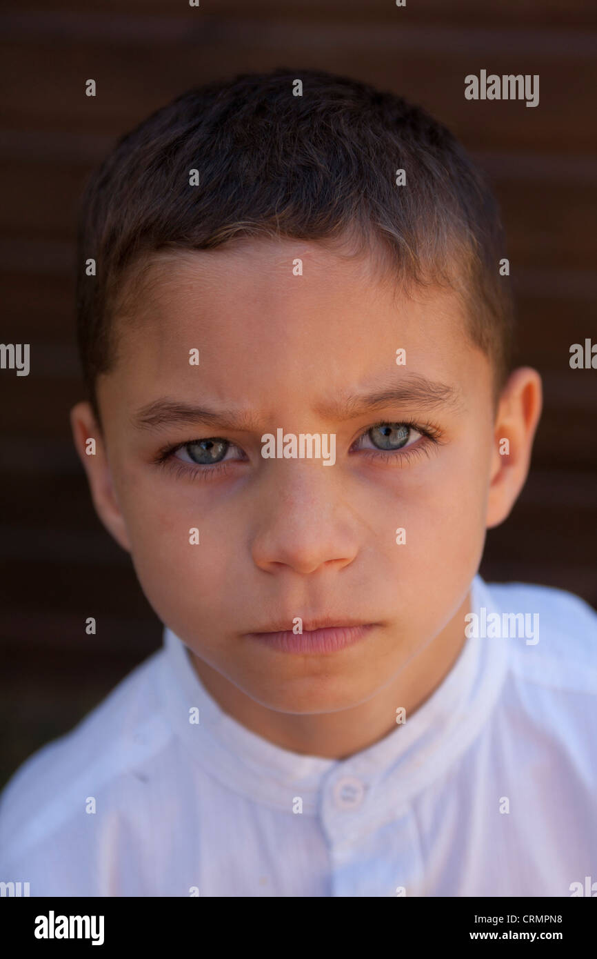 little boy with serious expression Stock Photo - Alamy