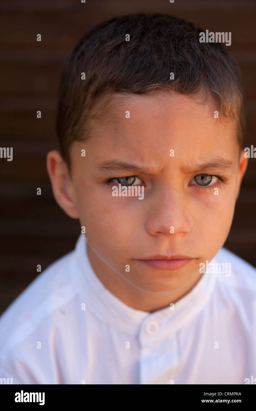 little boy with serious expression Stock Photo - Alamy