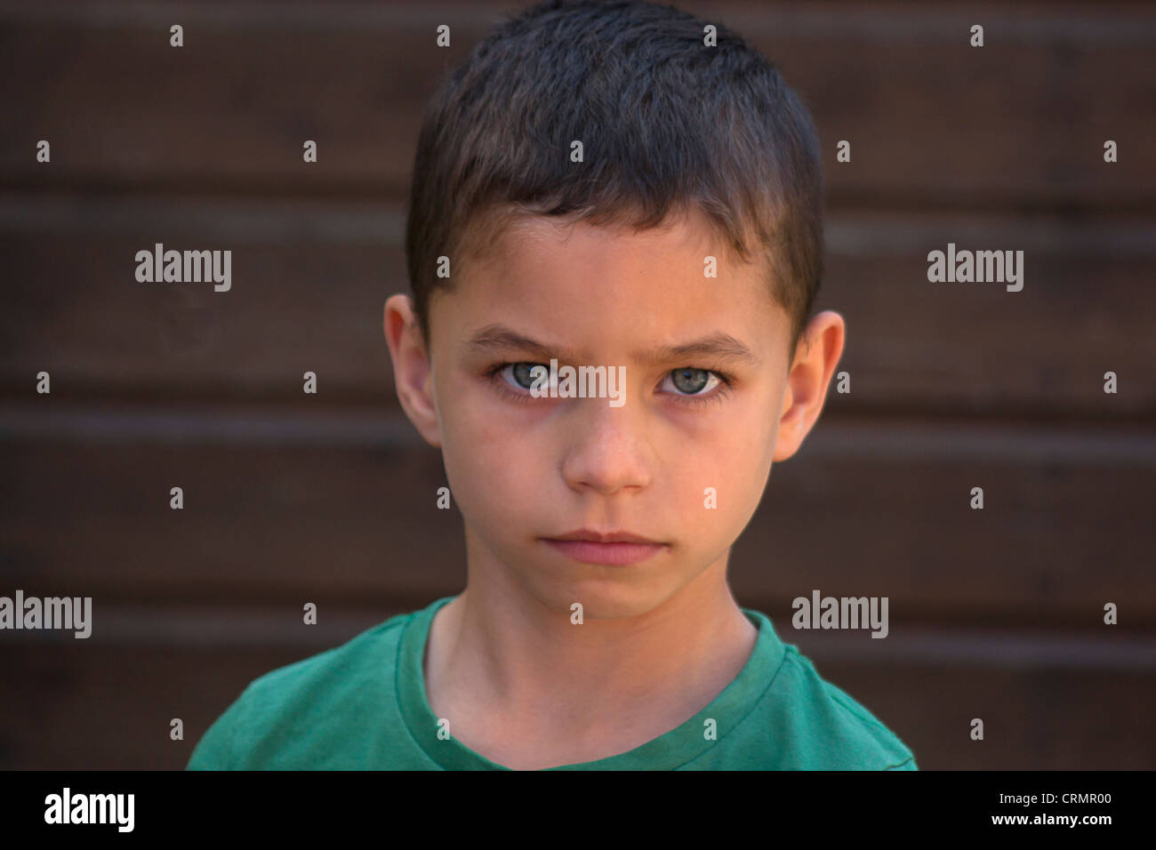 little boy with serious expression Stock Photo - Alamy