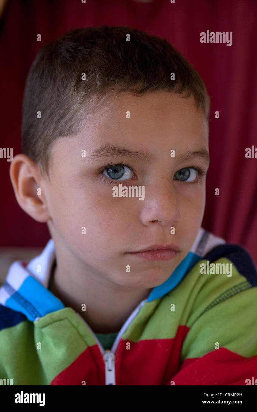 little boy with serious expression Stock Photo - Alamy