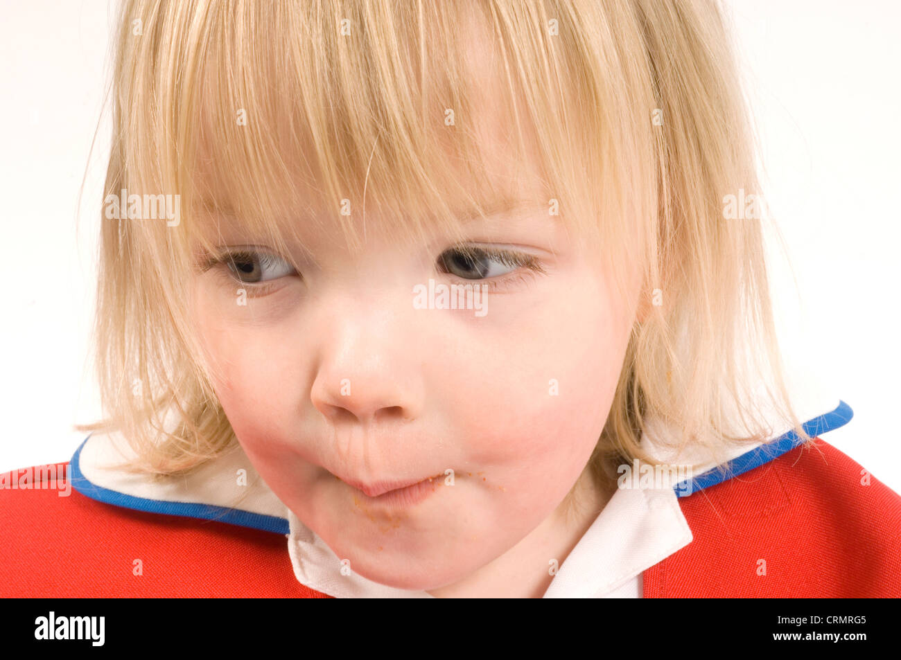 Young child eating crisps Stock Photo - Alamy