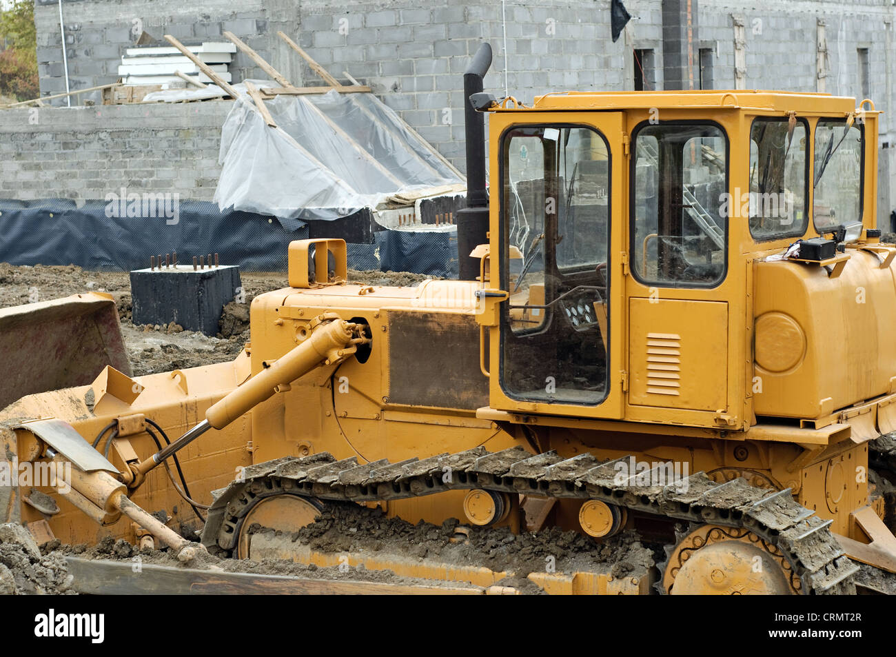 Photo of bulldozer on building site Stock Photo - Alamy