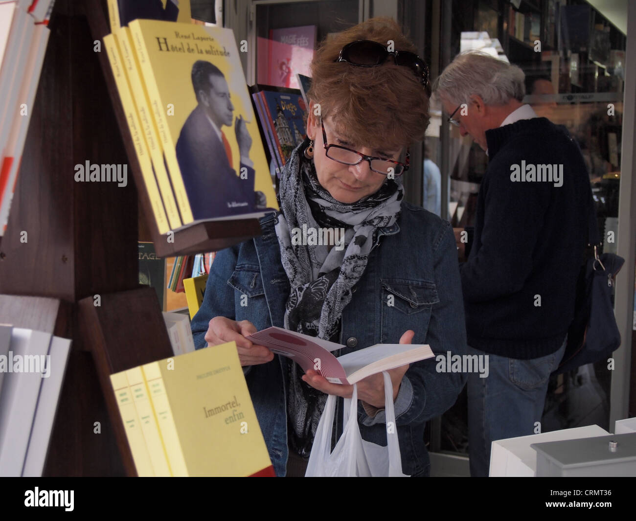 Woman perusing hi-res stock photography and images - Alamy