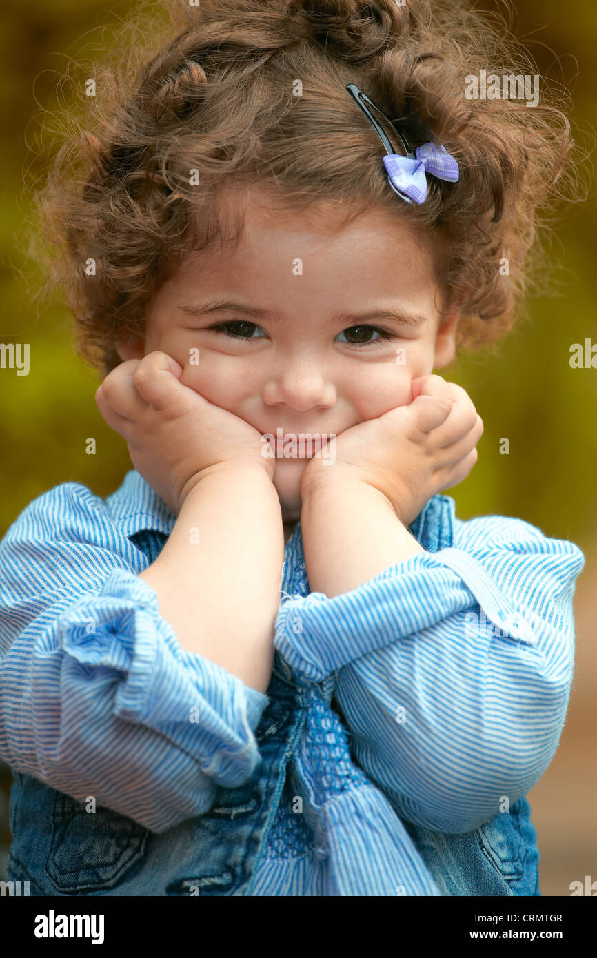 Portrait of happy two year old little girl outdoor Stock Photo - Alamy
