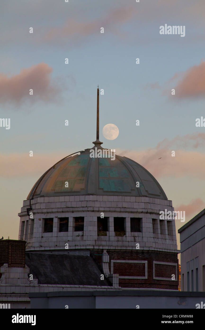 A full moon rising behind Bradford Odeon Stock Photo - Alamy