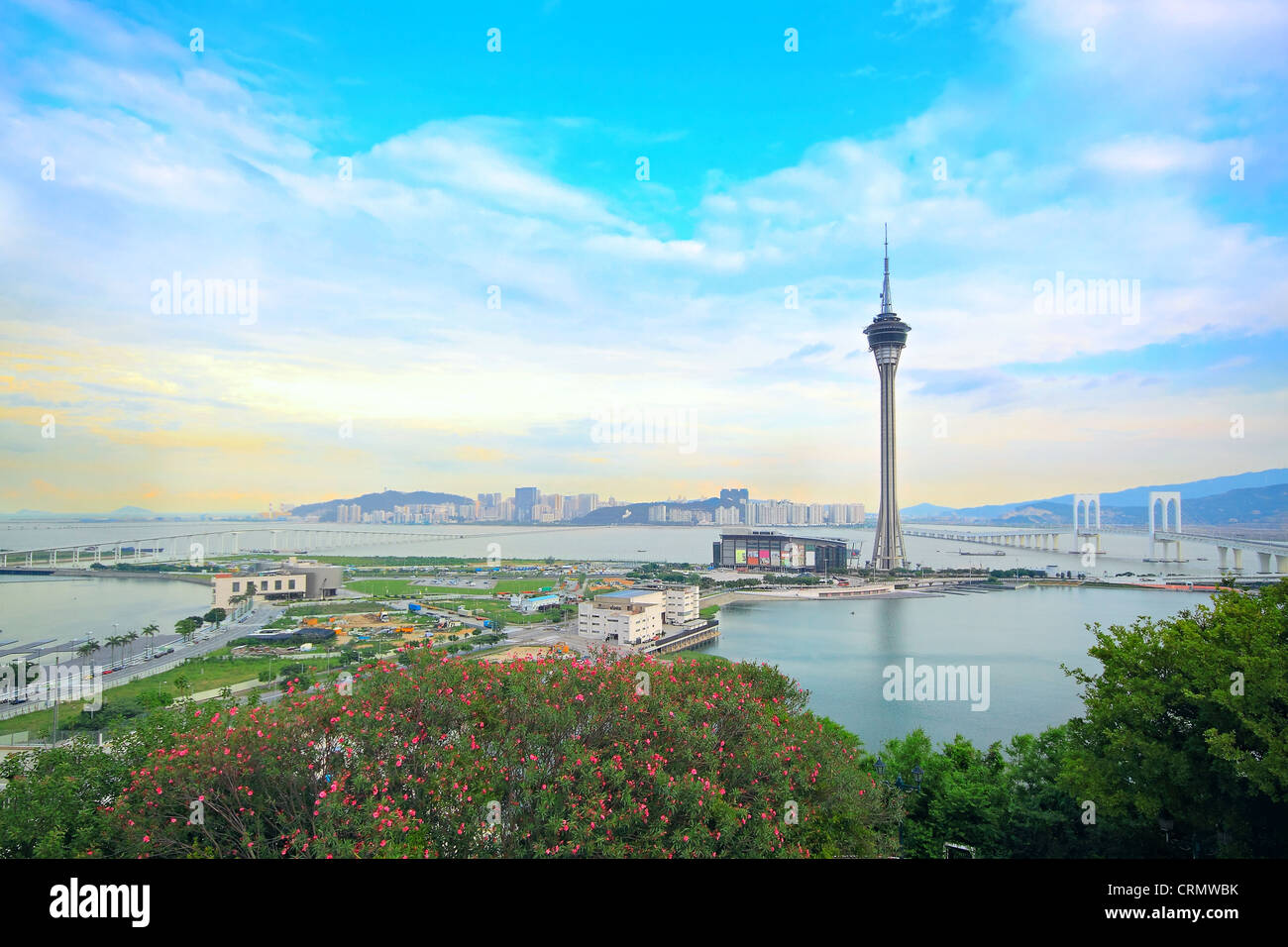 Urban landscape of Macau with famous traveling tower under blue sky ...