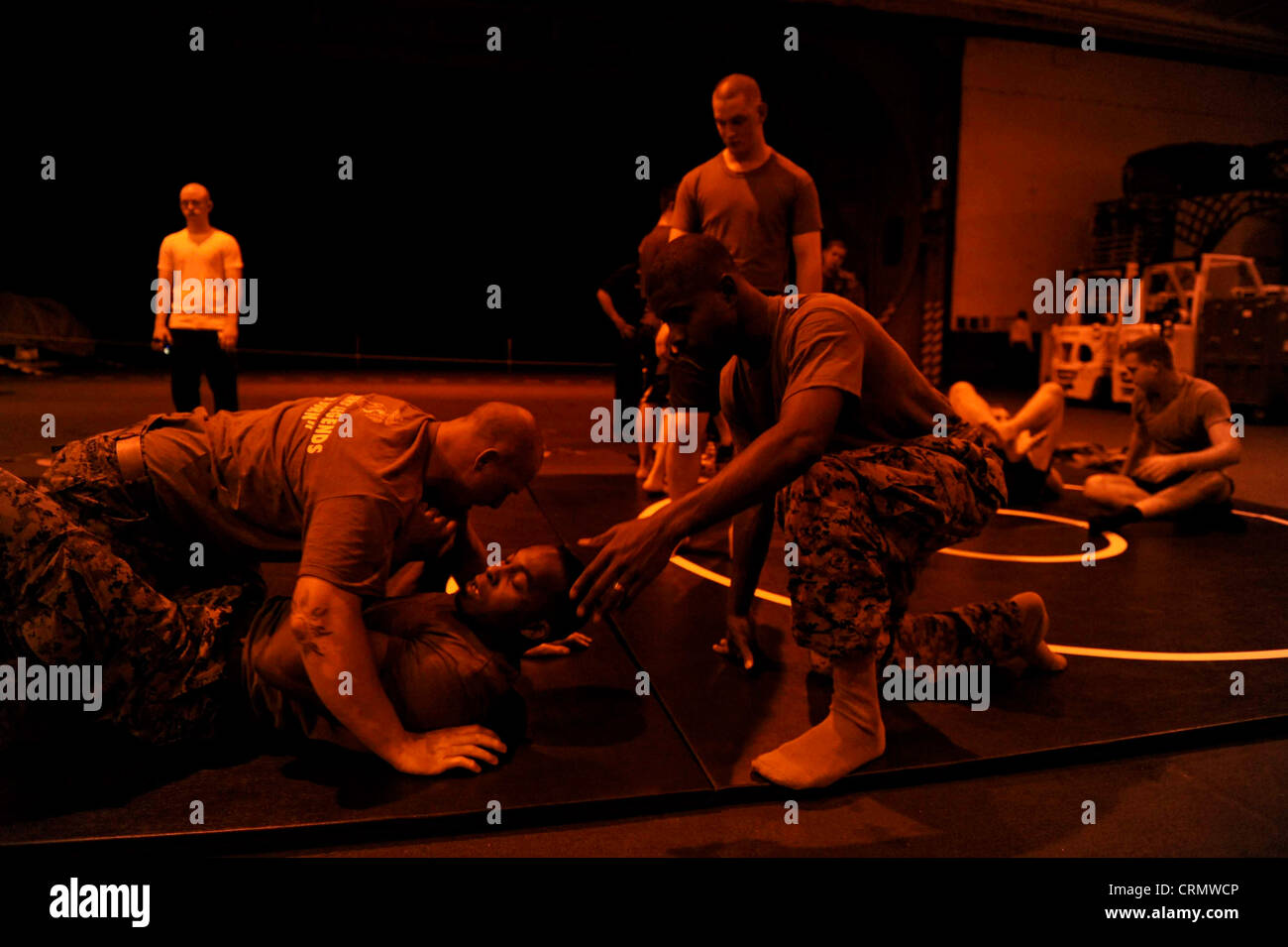 Marines participate in the Marine Corps Martial Arts Program (MCMAP) in ...