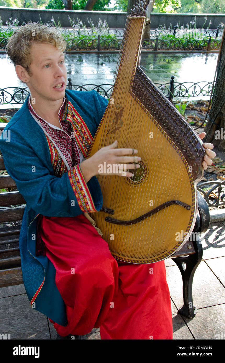 Ukraine, Odessa. Young musician on Primorsky Boulevard playing the 64 ...
