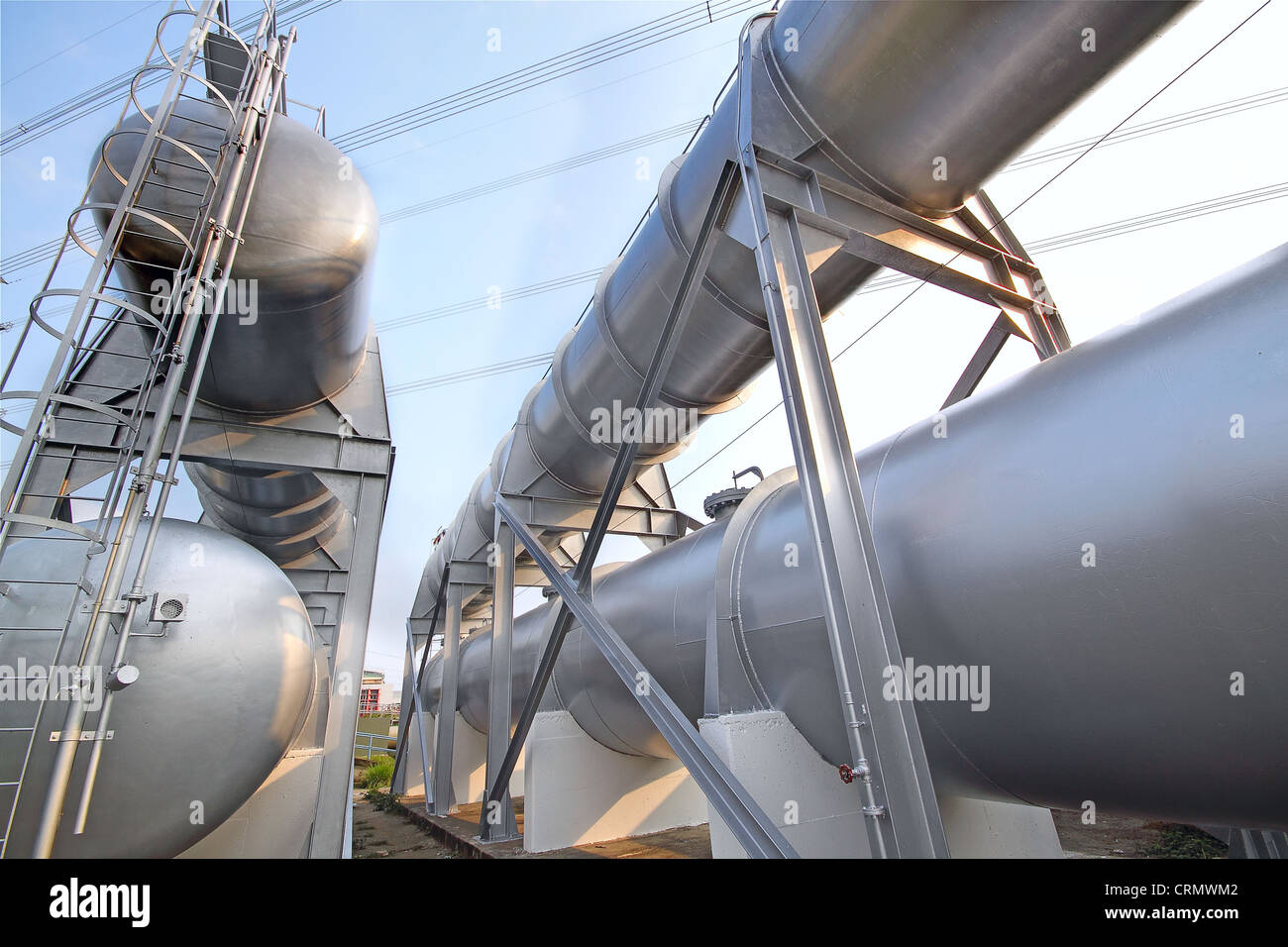Big gas container against the blue sky Stock Photo - Alamy