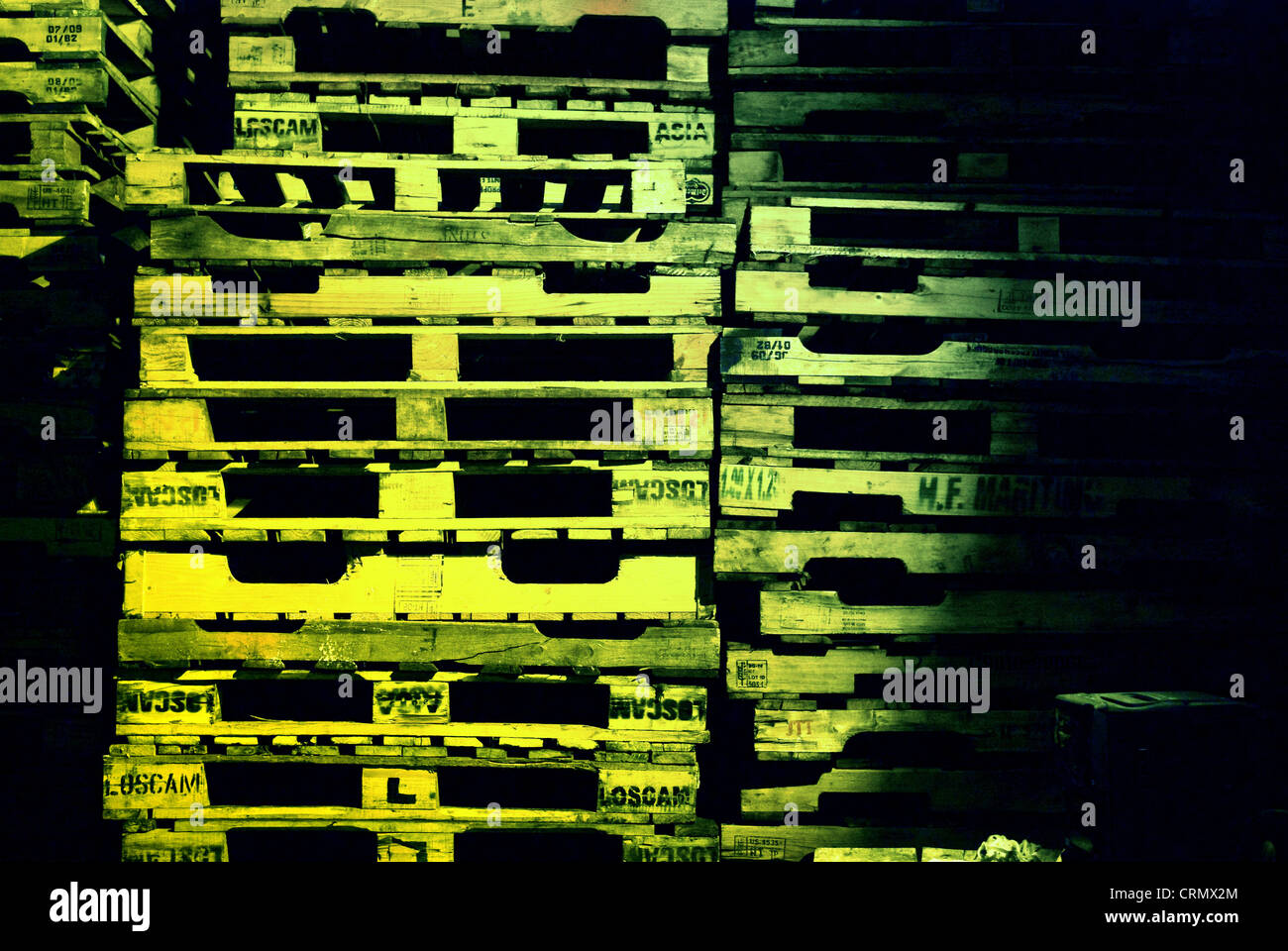 pile of pallets at night Stock Photo - Alamy