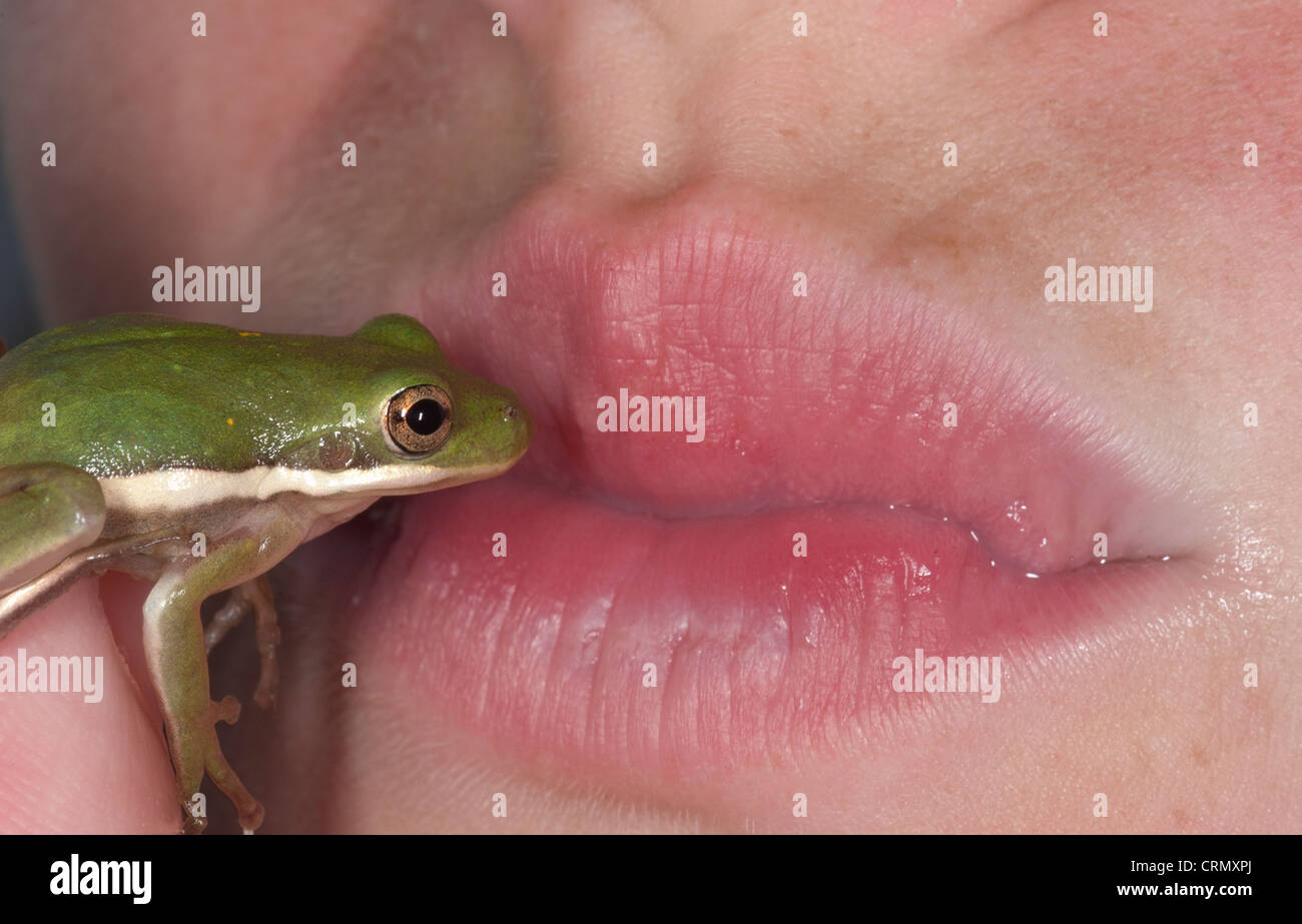 girl kissing a frog Stock Photo - Alamy