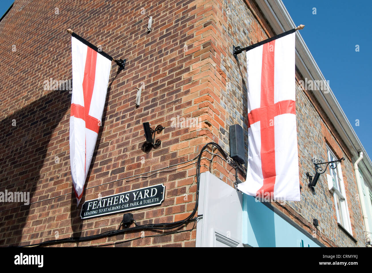 A pair of St. George flags attached to a building at Wallingford ...