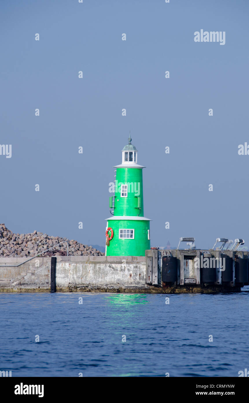 Denmark, Helsingoer. Brightly colored North Sea port lighthouse Stock ...