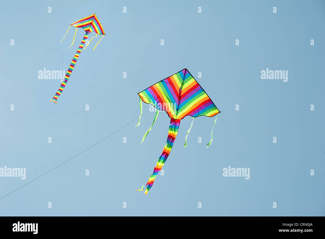 Child flying colorful kite hi-res stock photography and images - Alamy