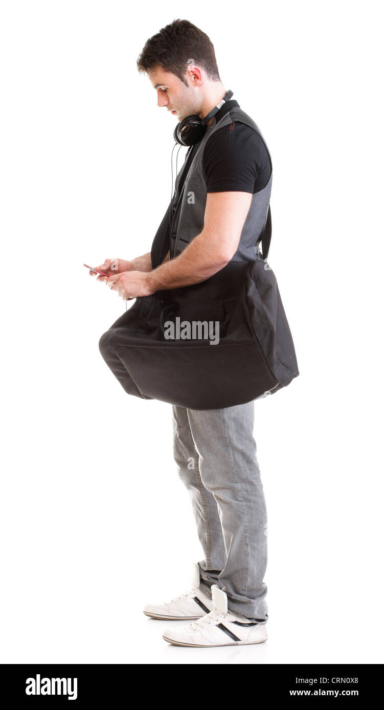 Full length portrait school boy with phone isolated on white. Music or ...