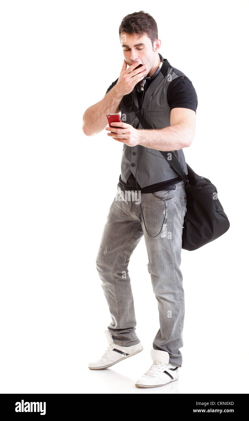 Full length portrait school boy with phone isolated on white. Music or ...