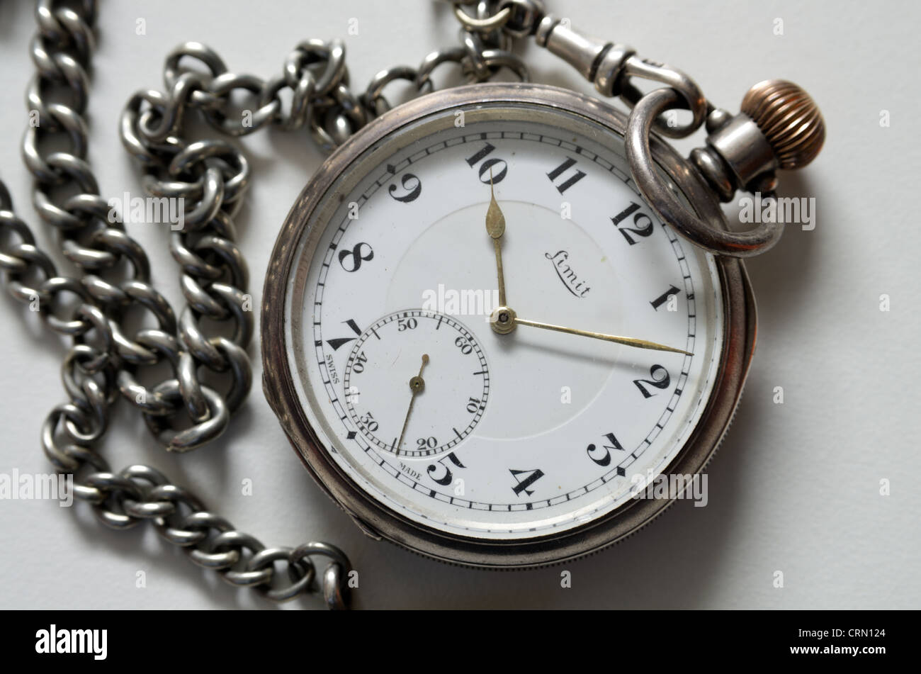 A man's silver pocket watch with second dial silver chain watch guard ...