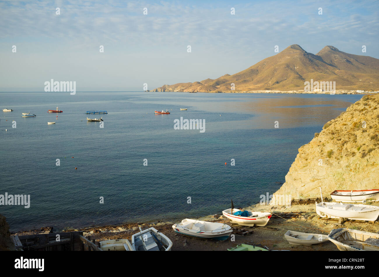 Fishing boat mooring in idyllic Isleta del Moro bay, Almeria, Andalusia ...