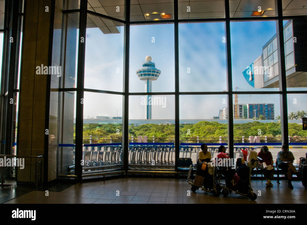Flight control tower at new modern airport terminal in Singapore ...