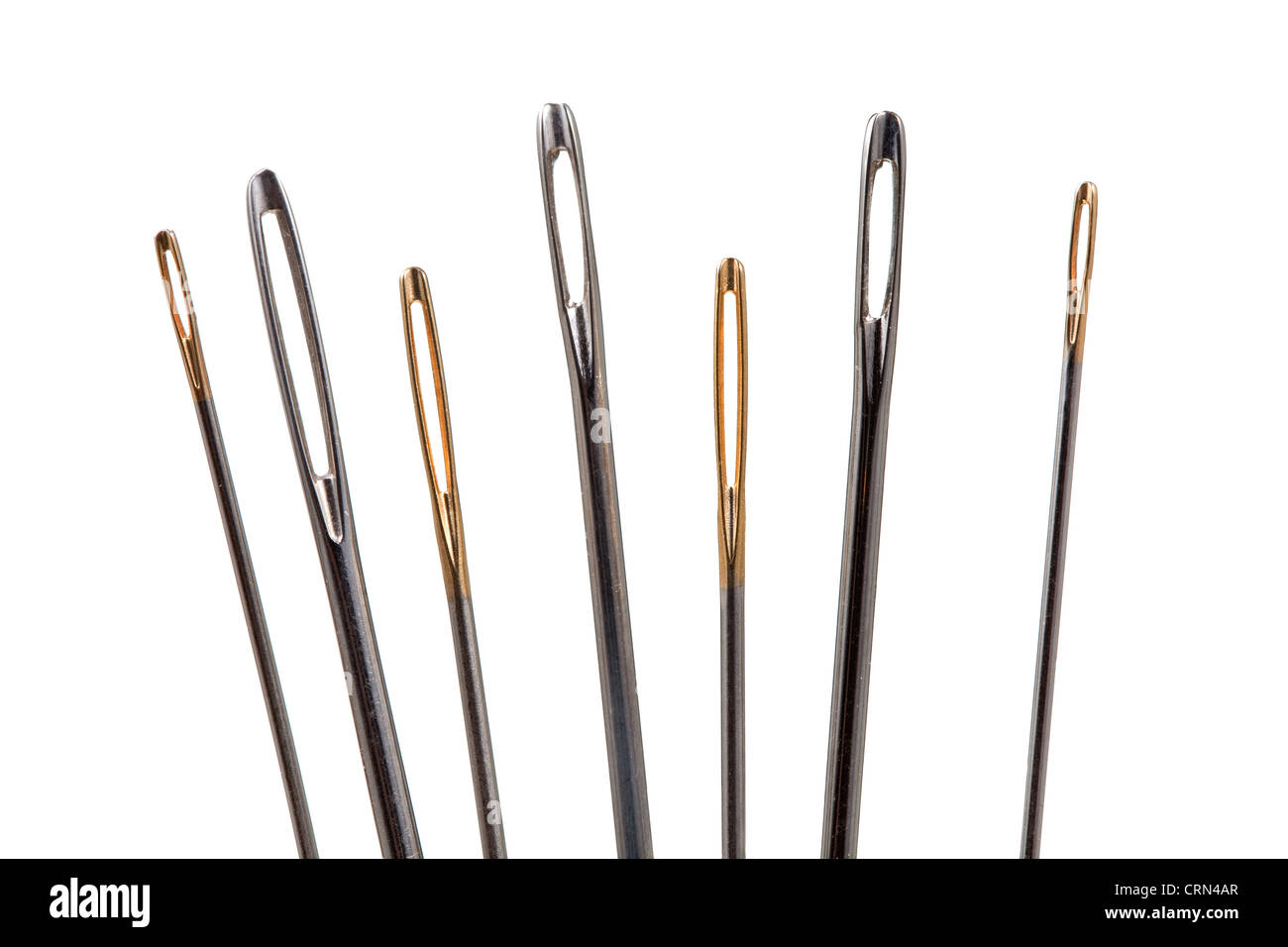 needle's eyes close-up on white background Stock Photo - Alamy