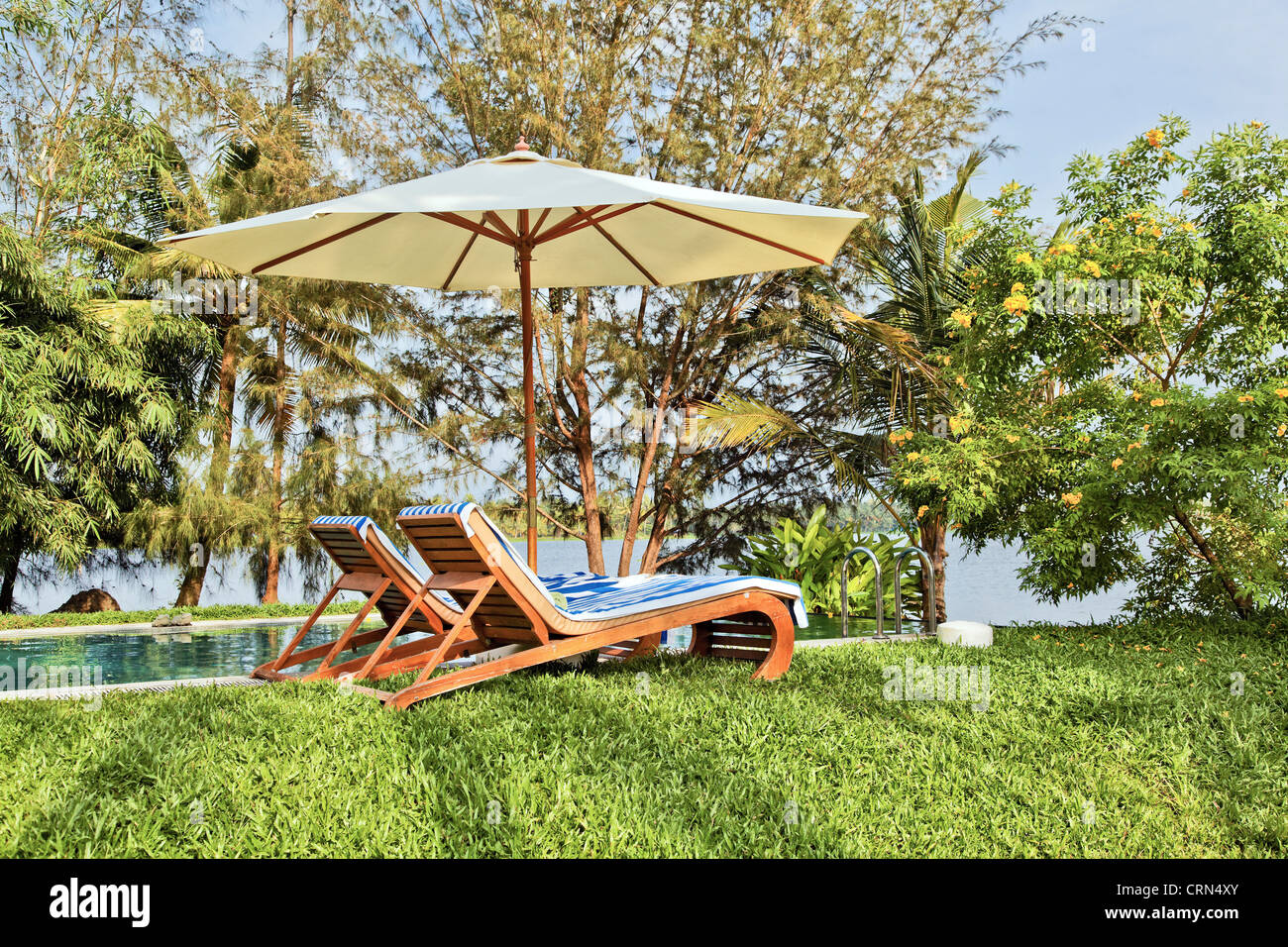 Landscape at the Green Lagoon infinity poolside with mature mature ...