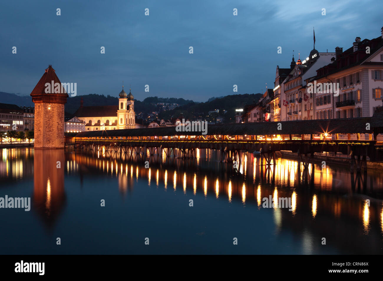 Wooden bridge in Lucerne at night Stock Photo - Alamy