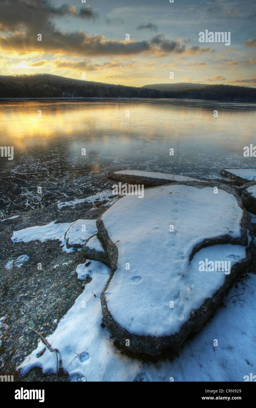 Cold snowy winter sunrise at a lake Stock Photo - Alamy