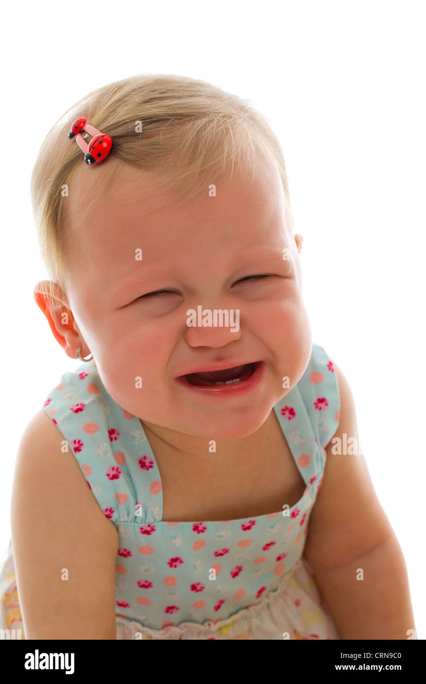 crying baby girl - studio shot over white Stock Photo - Alamy