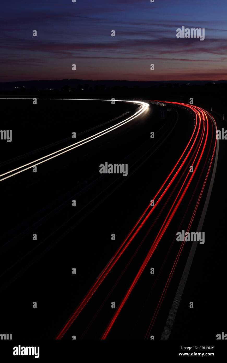 Cars in a rush moving fast on a highway Stock Photo - Alamy
