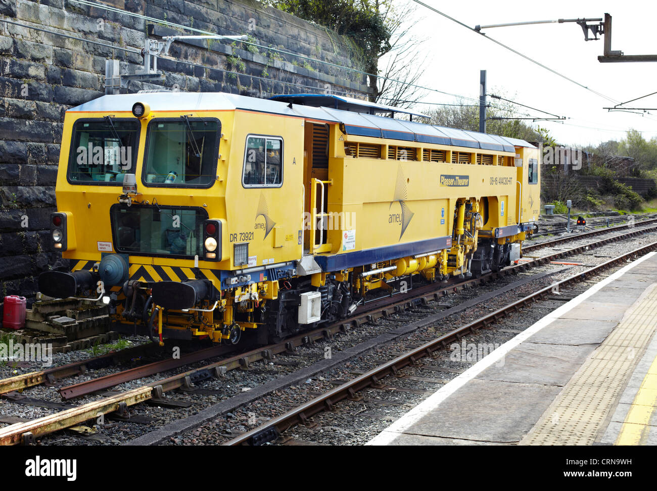 Plasser & Theurer track tamping machine at Lancaster station Stock ...