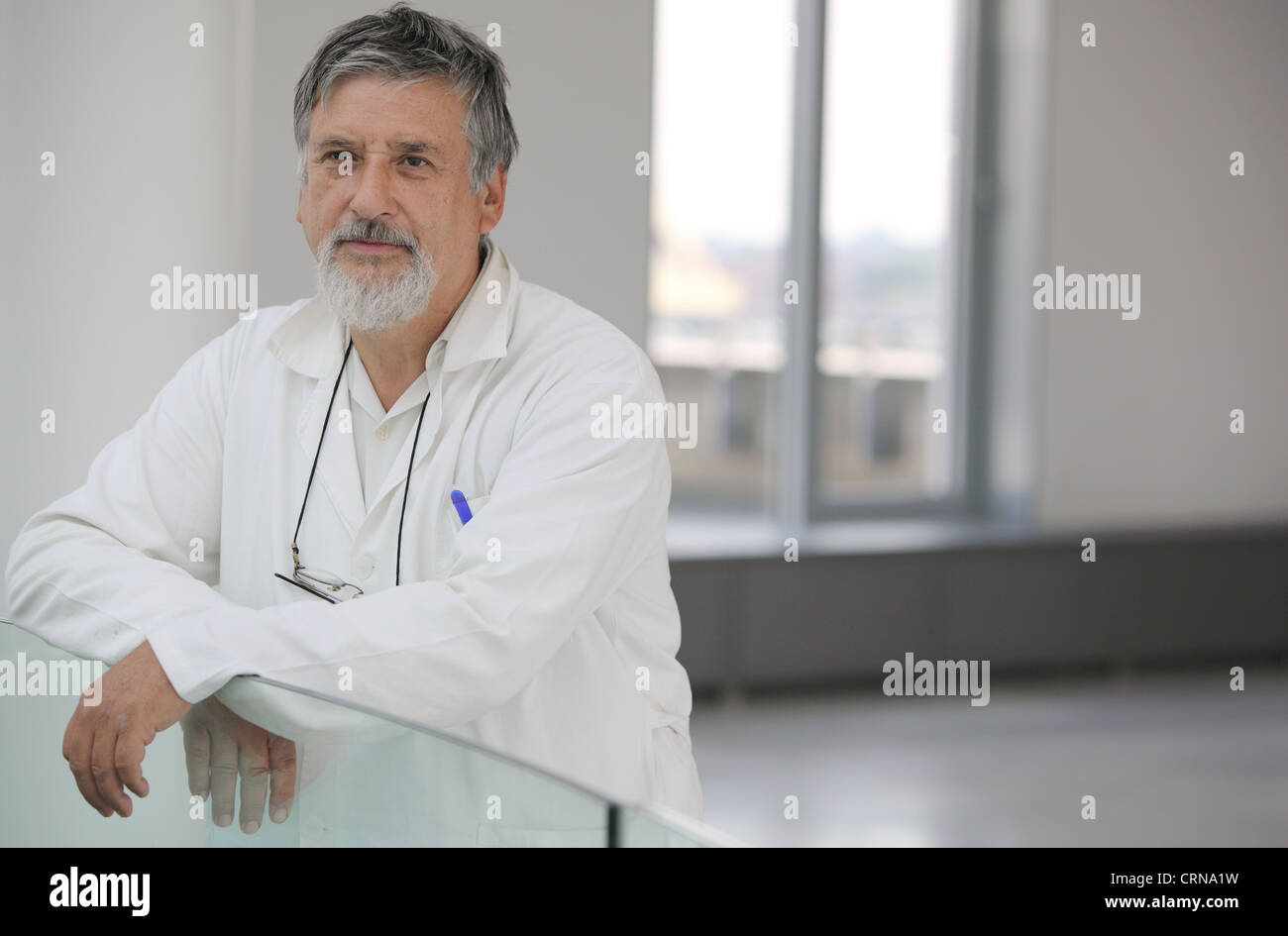 Renowned scientist/doctor in a research center/hospital looking ...