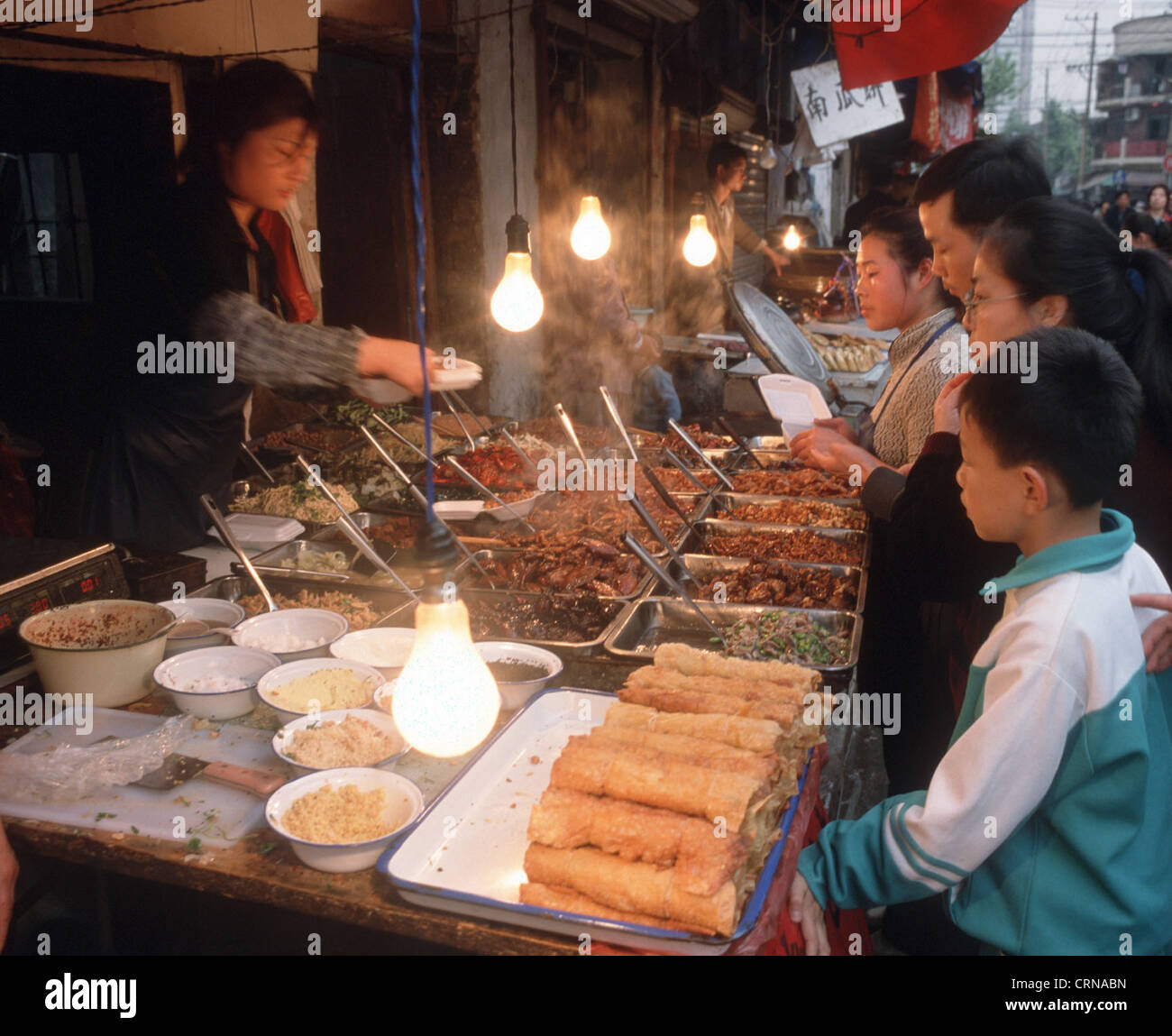 Snack Street in downtown Shanghai Stock Photo - Alamy
